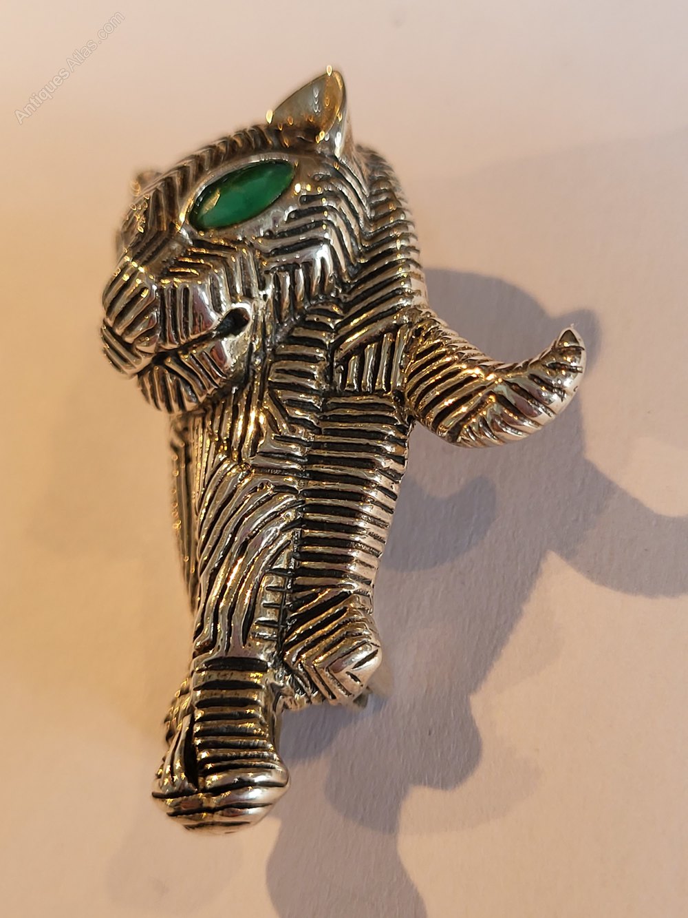 Antiques Atlas - Art Deco. Sterling Siver & Emerald Tiger Cloak Pin