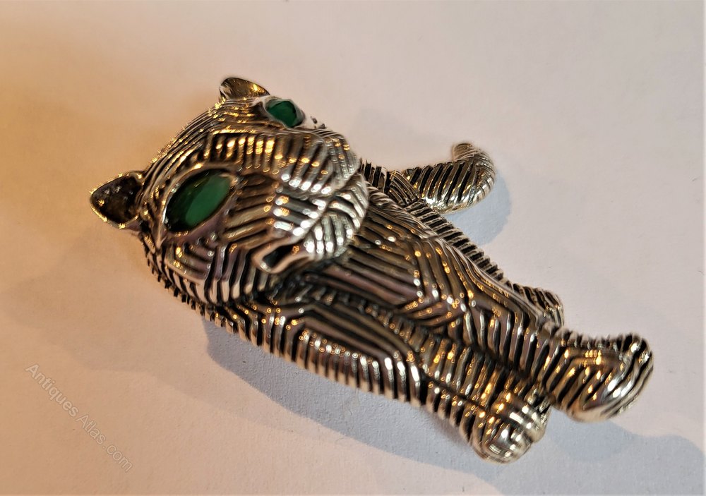 Antiques Atlas - Art Deco. Sterling Siver & Emerald Tiger Cloak Pin