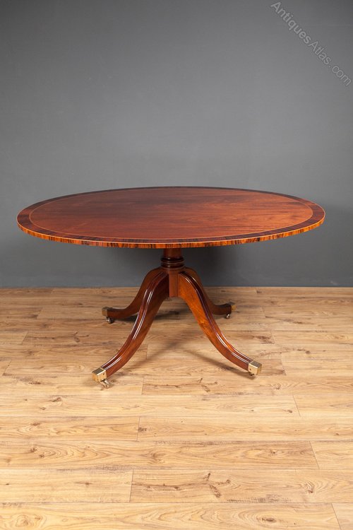 Antiques Atlas - Mahogany Oval Tip Top Dining Table