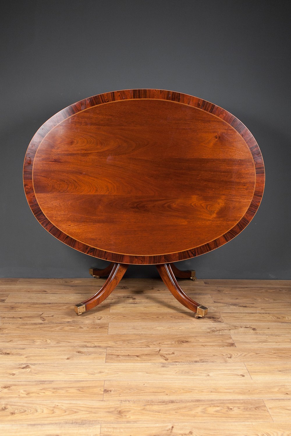 Antiques Atlas - Mahogany Oval Tip Top Dining Table