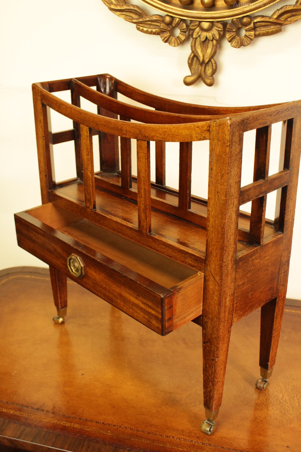 A Mahogany Magazine Rack - Antiques Atlas
