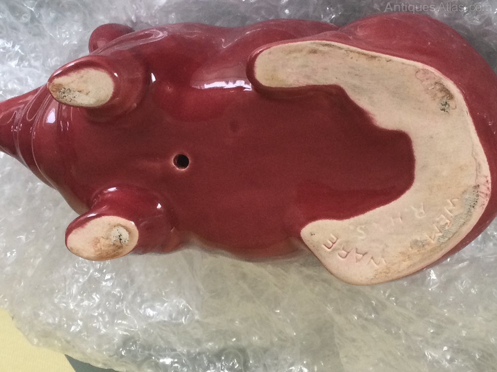 Antiques Atlas - Scottish Wemyss Ware Deep Ruby Glaze Small Pig