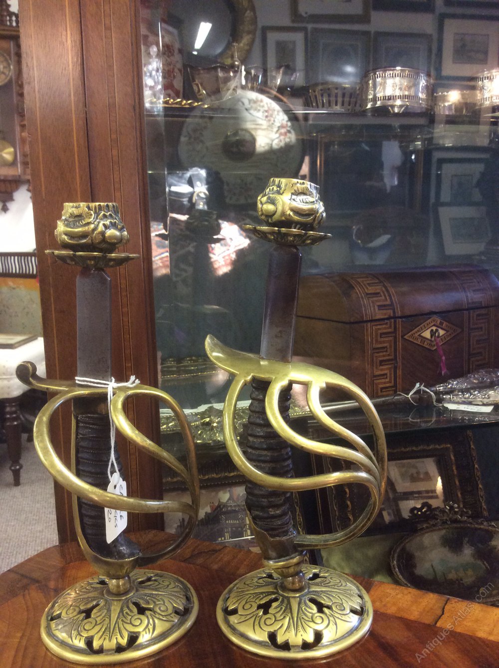 Antiques Atlas - Two Sword Hilt Candlesticks