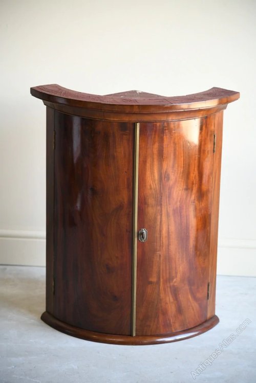 MAHOGANY BOW FRONT WALL CUPBOARD - Antiques Atlas