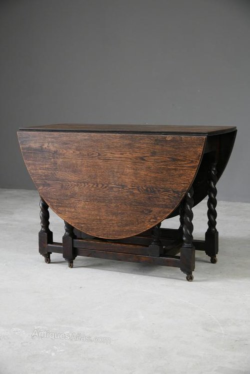Oak Oval Drop Leaf Dining Table - Antiques Atlas