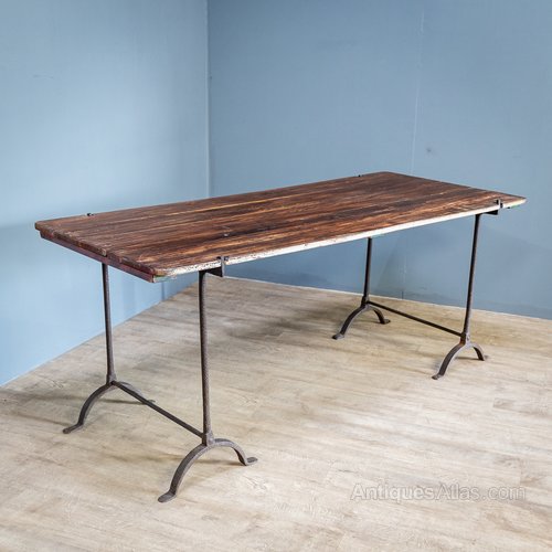 Stained Pine Trestle Table - Antiques Atlas