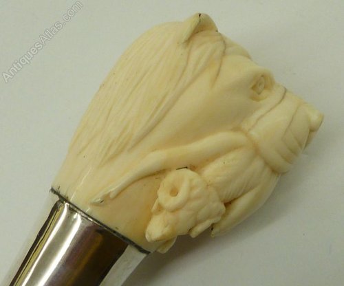 Antiques Atlas - Snake Wood Walking Stick Ivory Lions Head Pommel