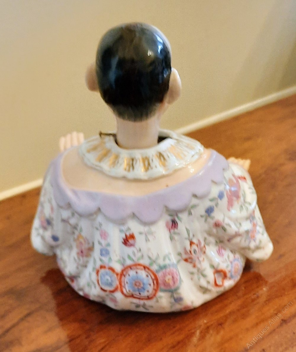 Antiques Atlas - A Porcelain Nodding Figure Of A Seated Chinaman