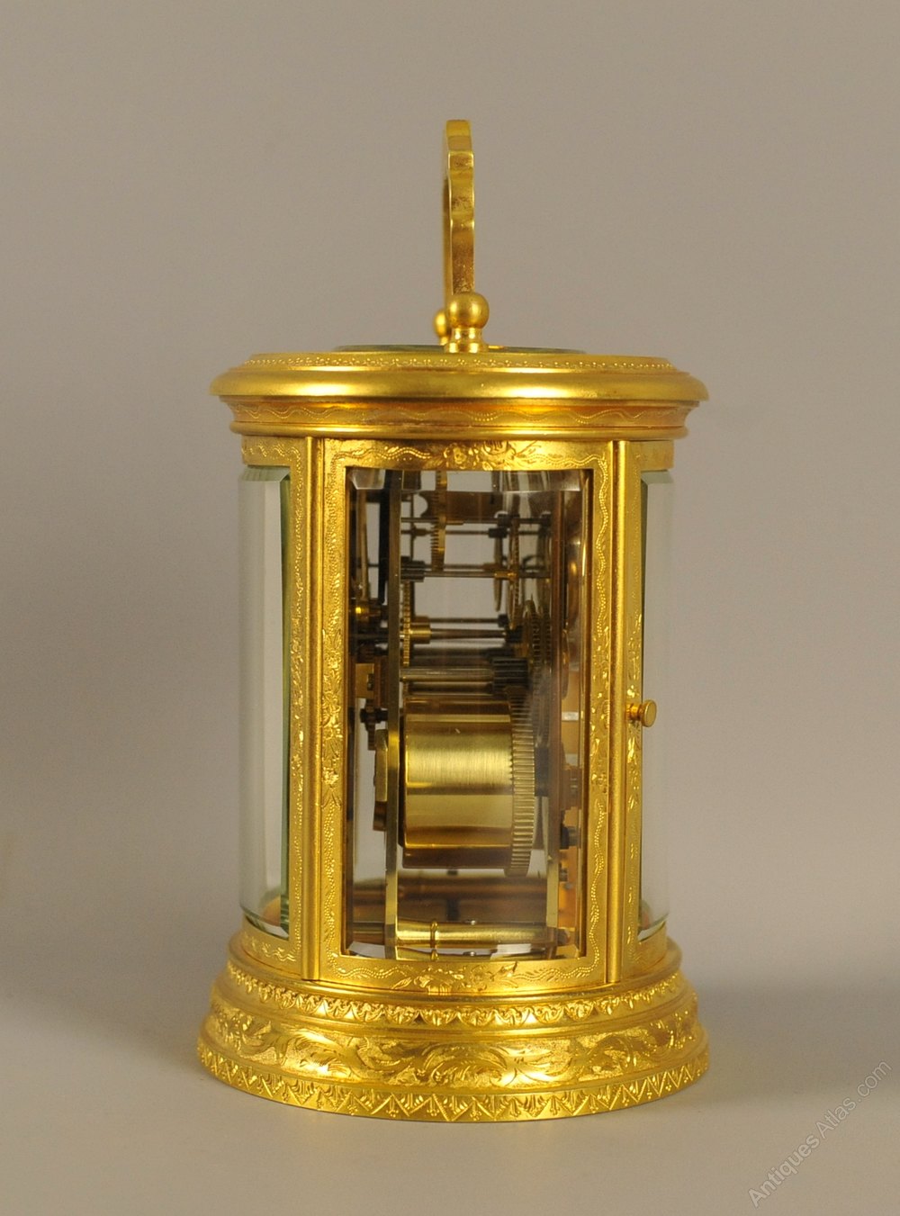 Antiques Atlas - Oval Engraved Bell Striking Carriage Clock