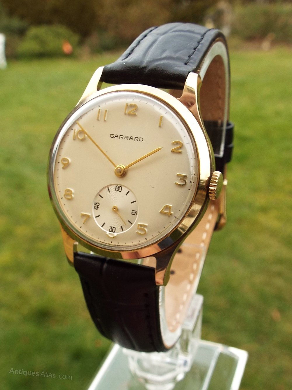 Antiques Atlas - A Mid-size 9ct Gold Garrard Wrist Watch