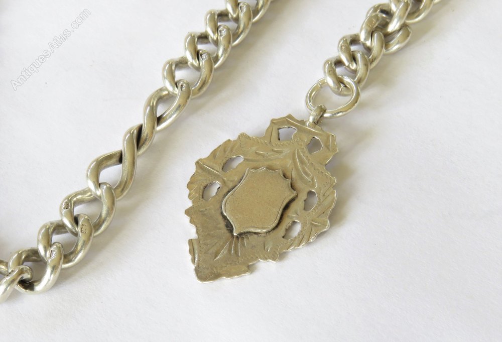 Antiques Atlas - Victorian Silver Watch Chain And Fob