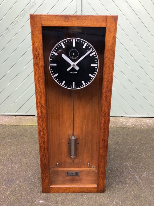 Antiques Atlas - Inducta Oak Cased Electric Factory Clock